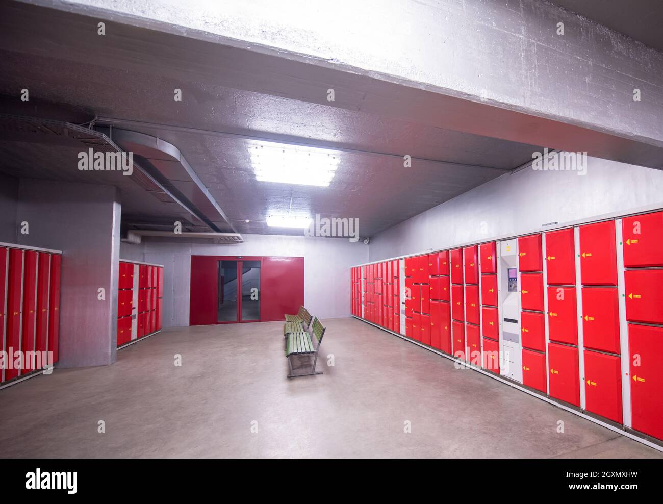 red safety lockers in empty Lockers Room Stock Photo - Alamy