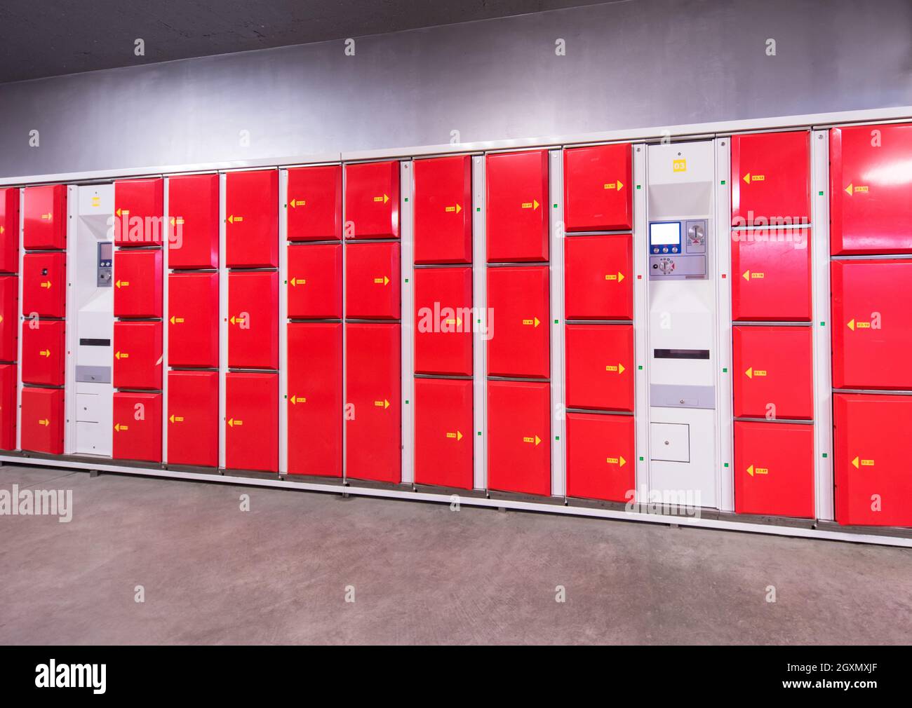 red safety lockers in empty Lockers Room Stock Photo - Alamy