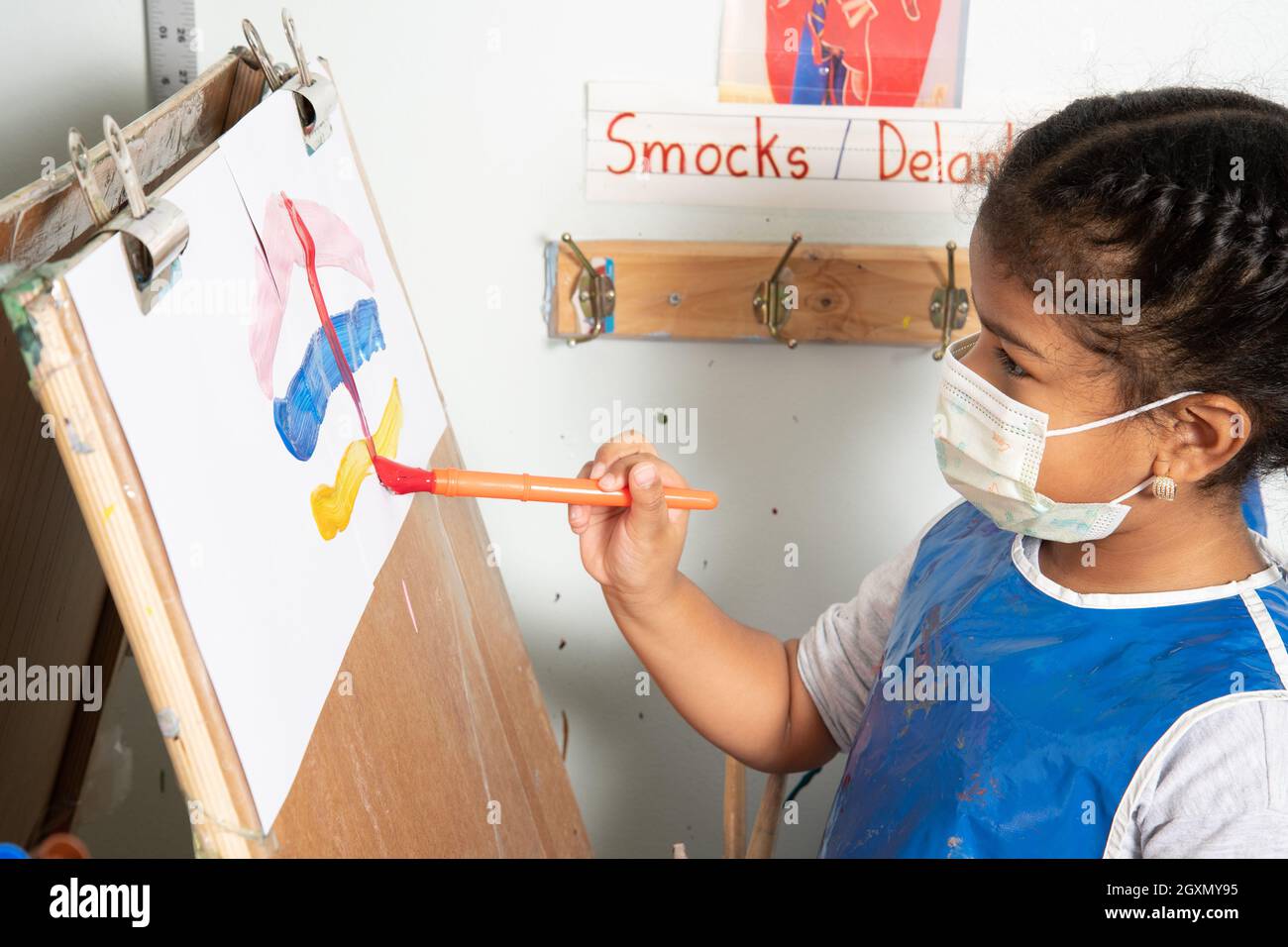 Girl 4 5 in nursery painting hi-res stock photography and images - Alamy