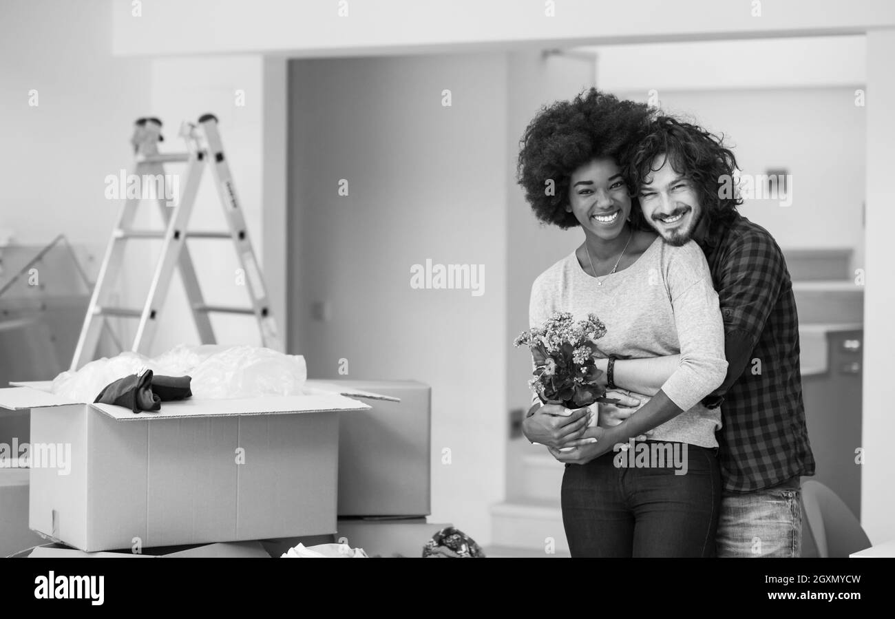 Unpacking boxes at home Black and White Stock Photos & Images - Alamy