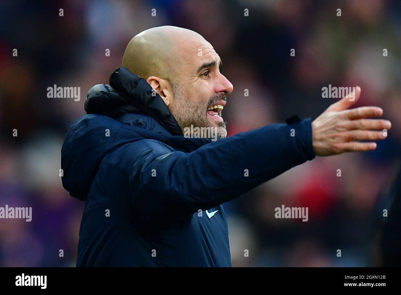 Manchester City manager Pep Guardiola reacts on the touchline Stock ...