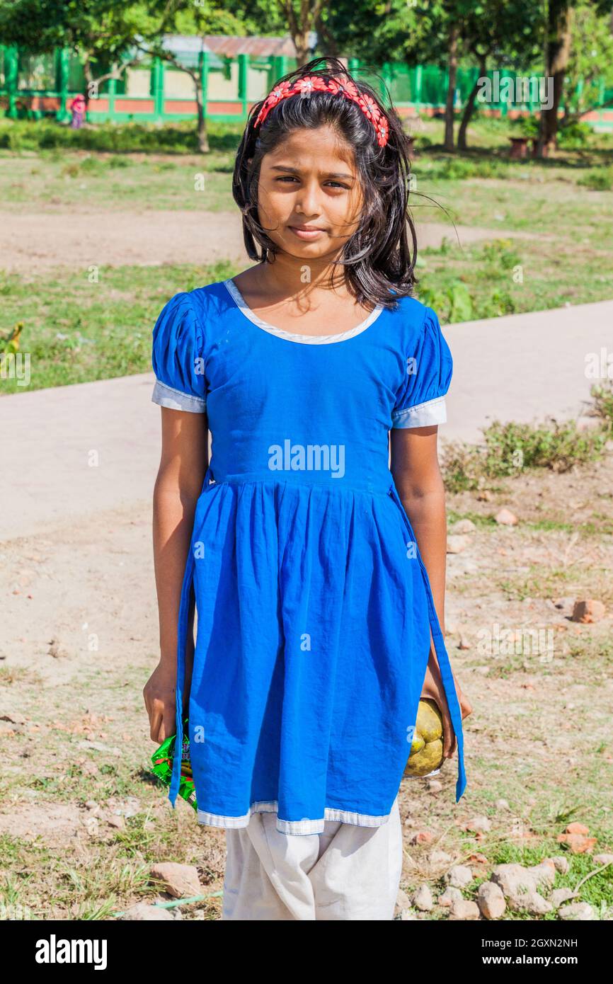 PAHARPUR, BANGLADESH - NOVEMBER 6, 2016: Local girl in Paharpur village ...