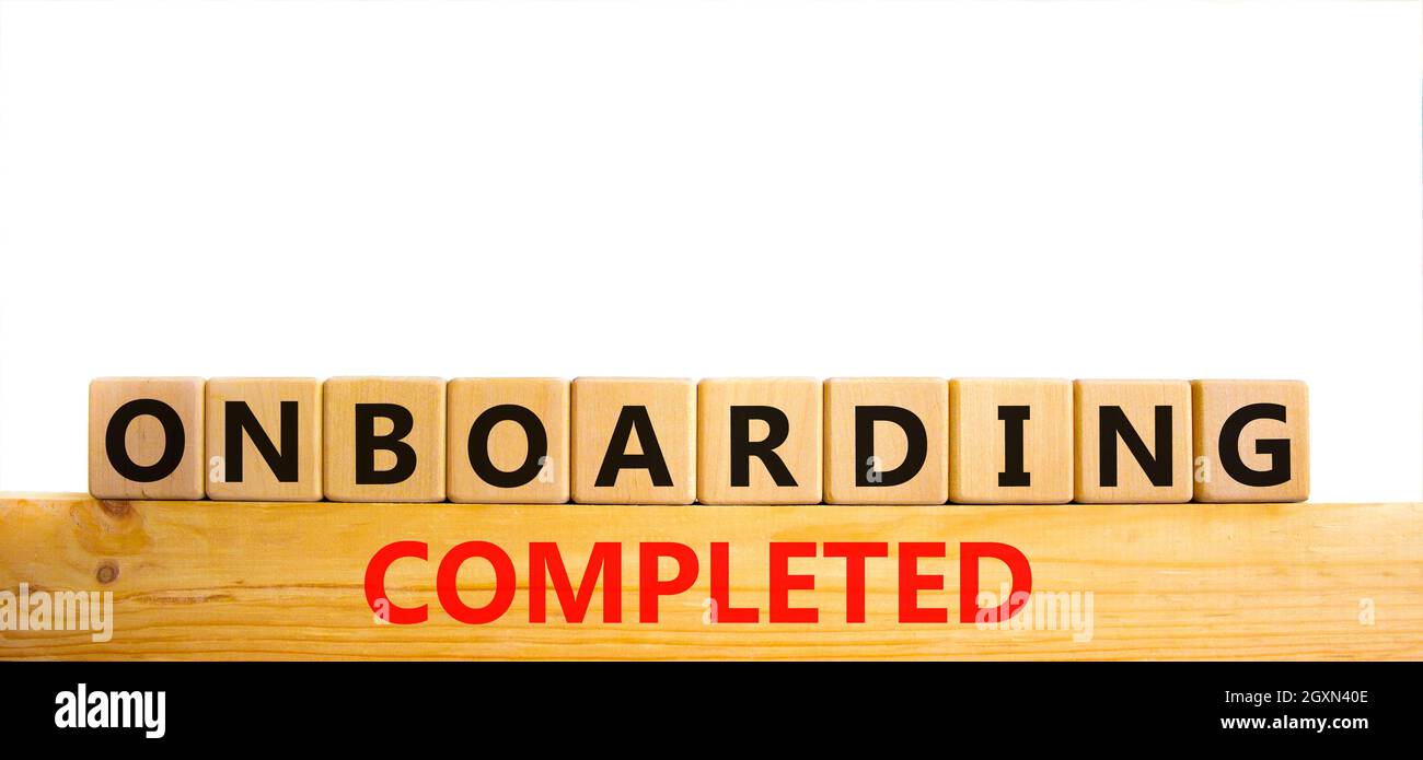 Onboarding completed symbol. Words 'Onboarding completed' on wooden ...