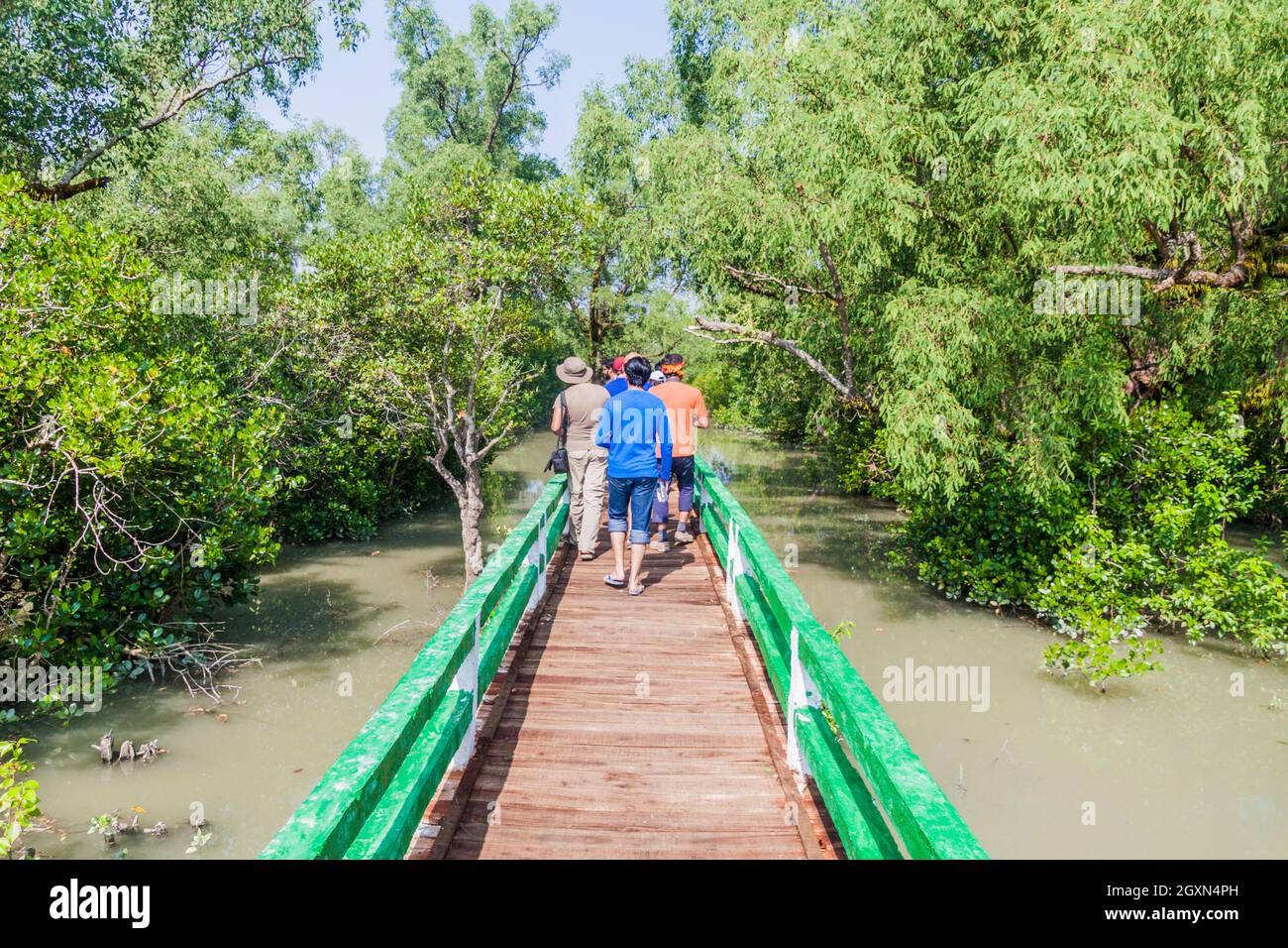 HIRON POINT, BANGLADESH - NOVEMBER 14, 2016: Tourists on a boardwalk at ...