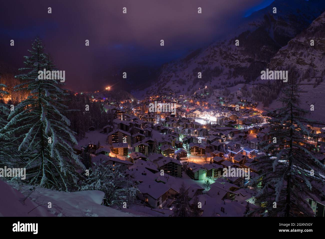 aerial view on zermatt valley and matterhorn peak at dusk with fresh ...