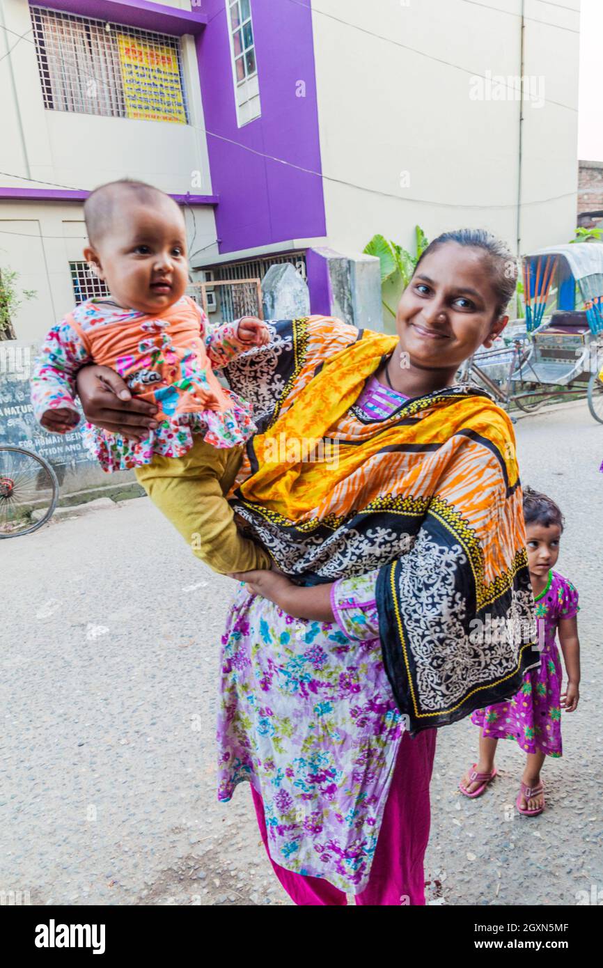 KHULNA, BANGLADESH - NOVEMBER 17, 2016: Mother with her baby in Khulna ...