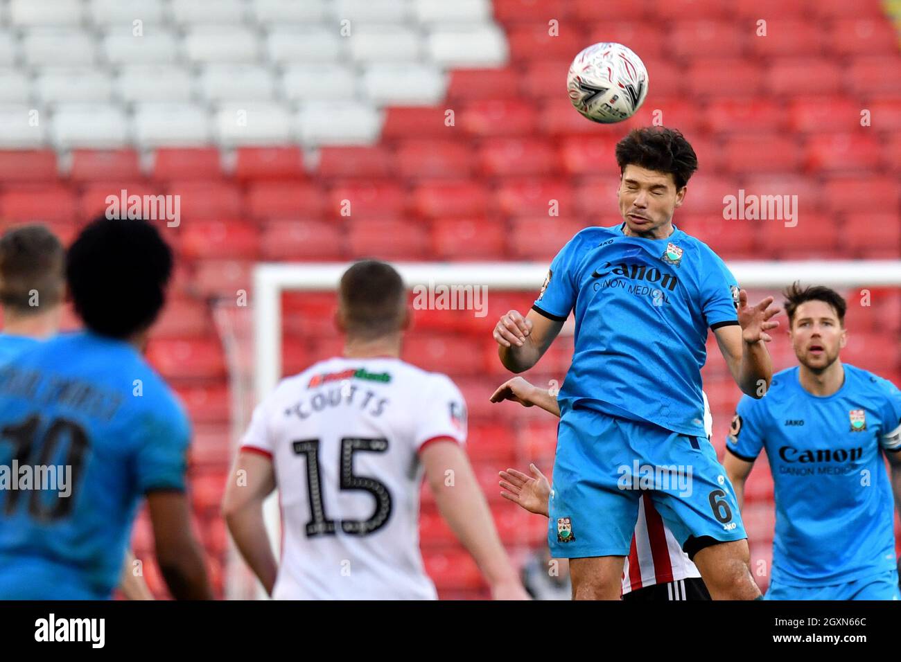 Barnet's Craig Robson compete for a header Stock Photo - Alamy