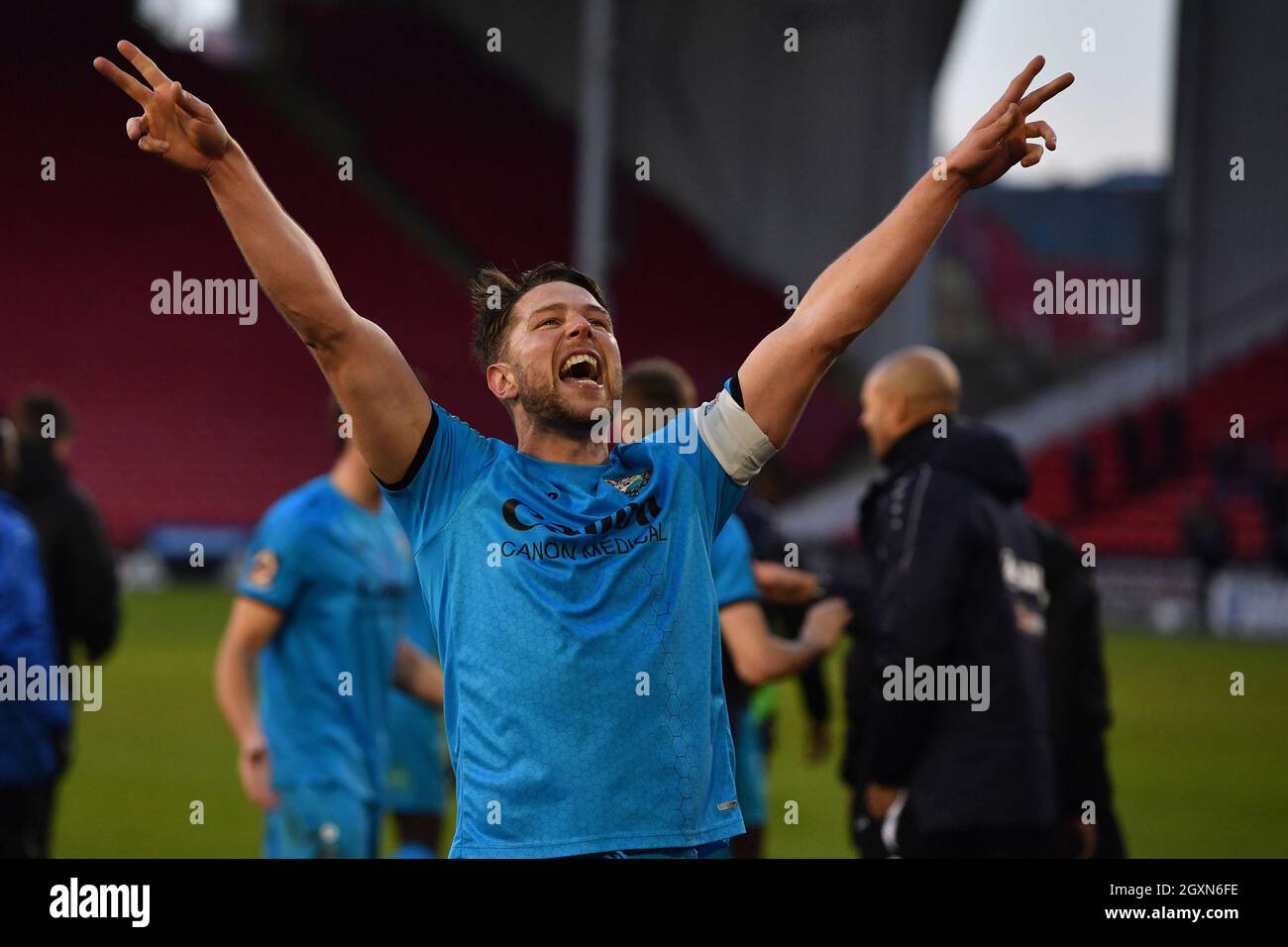 Barnet's captain Callum Reynolds celebrates as Barnet celebrates ...