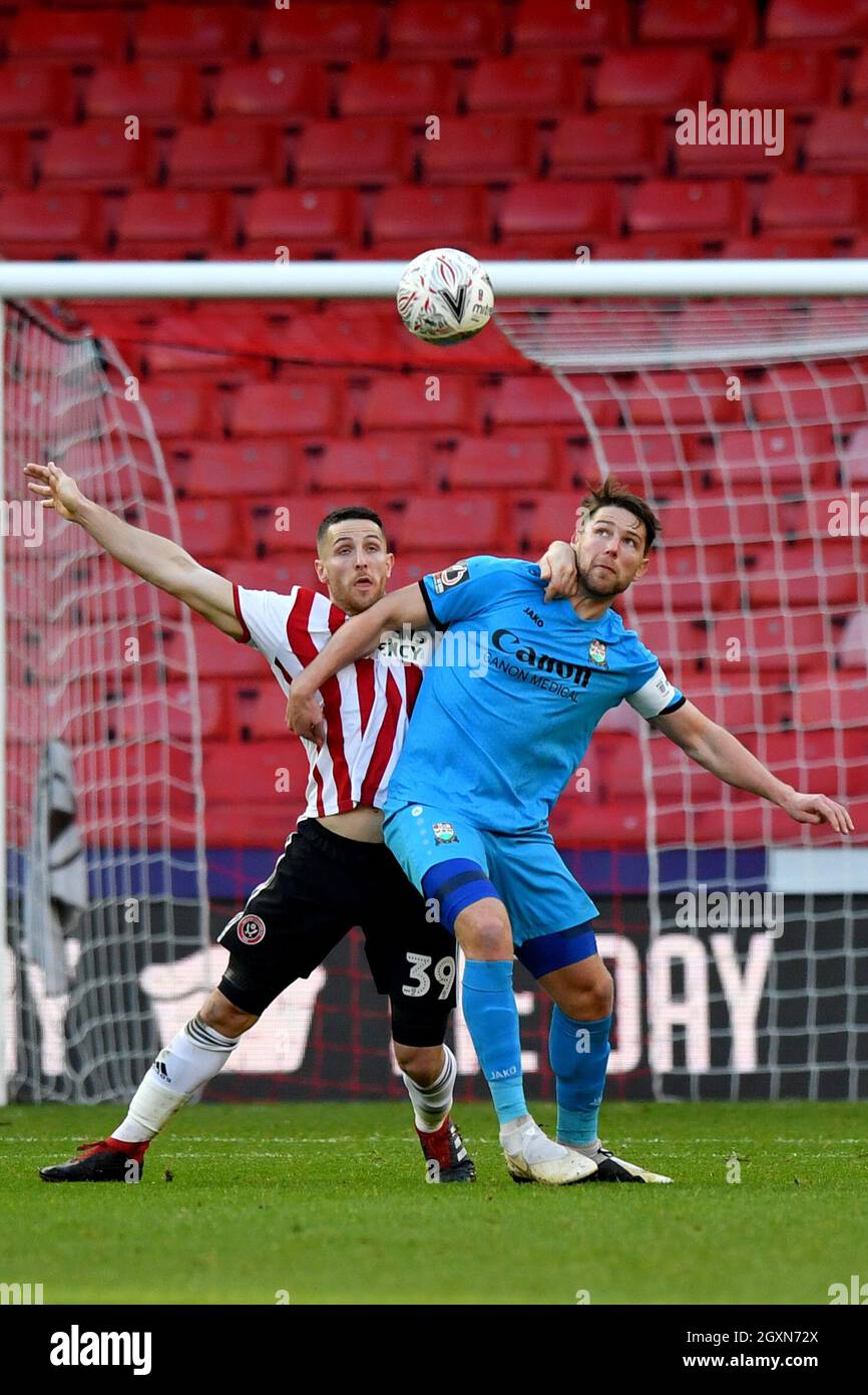 Barnet's captain Callum Reynolds and Sheffield United's Conor ...