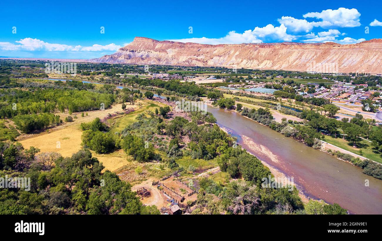Palisade Peaches along river with mountains Stock Photo - Alamy