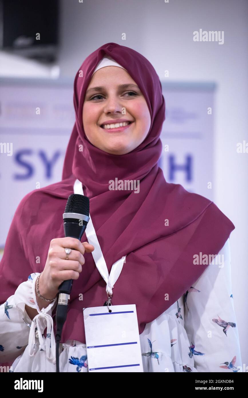 young muslim businesswoman at business conference room with public ...