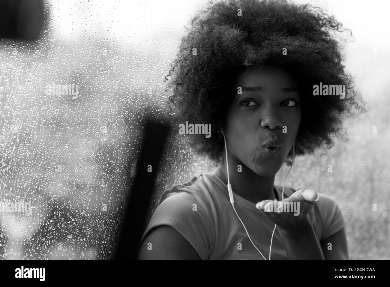 portrait of young afro american woman in gym on workout break while ...