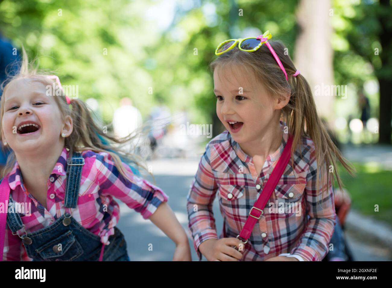 Little girls running hi-res stock photography and images - Alamy
