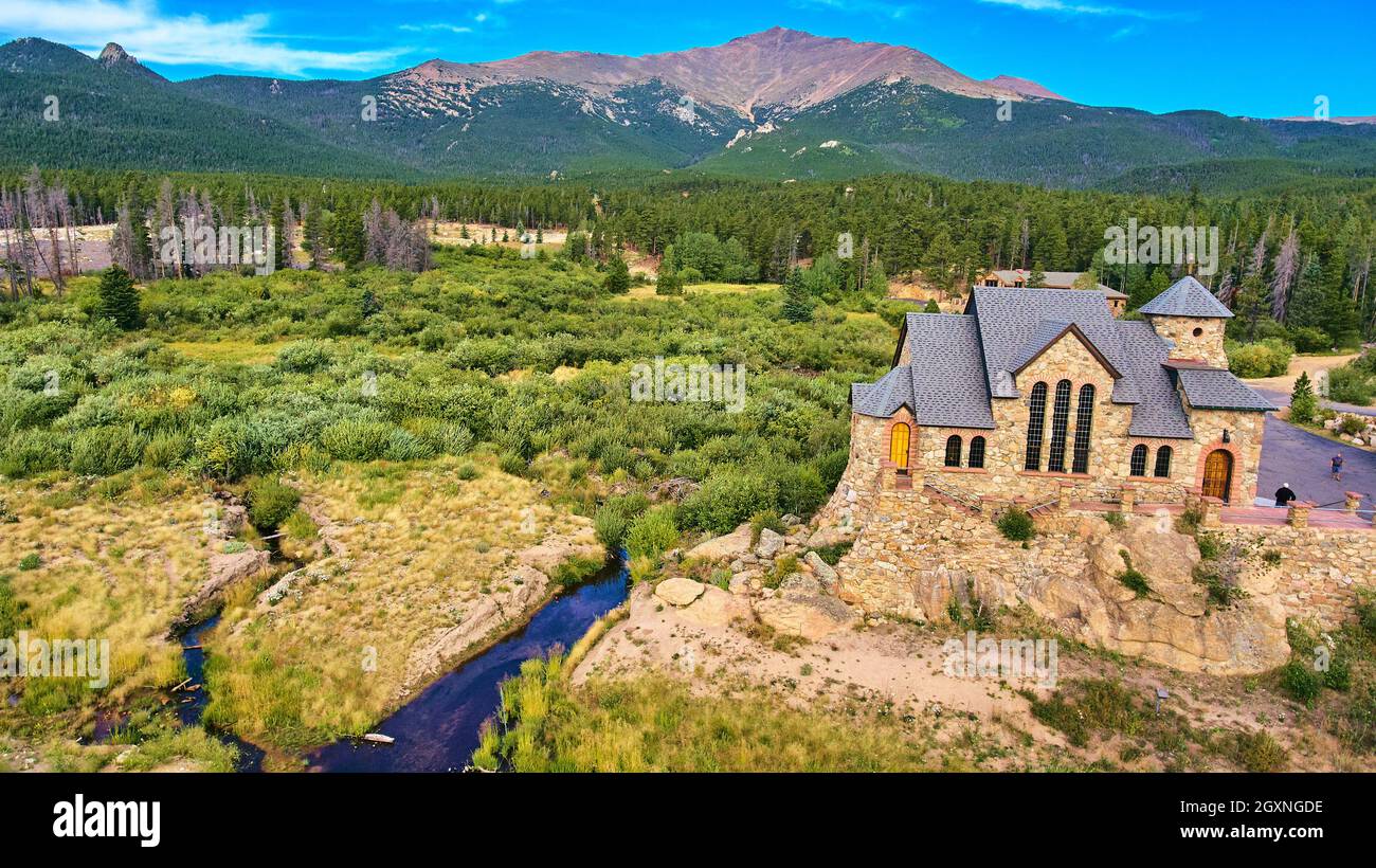 Old Church in landscape by large mountains Stock Photo - Alamy