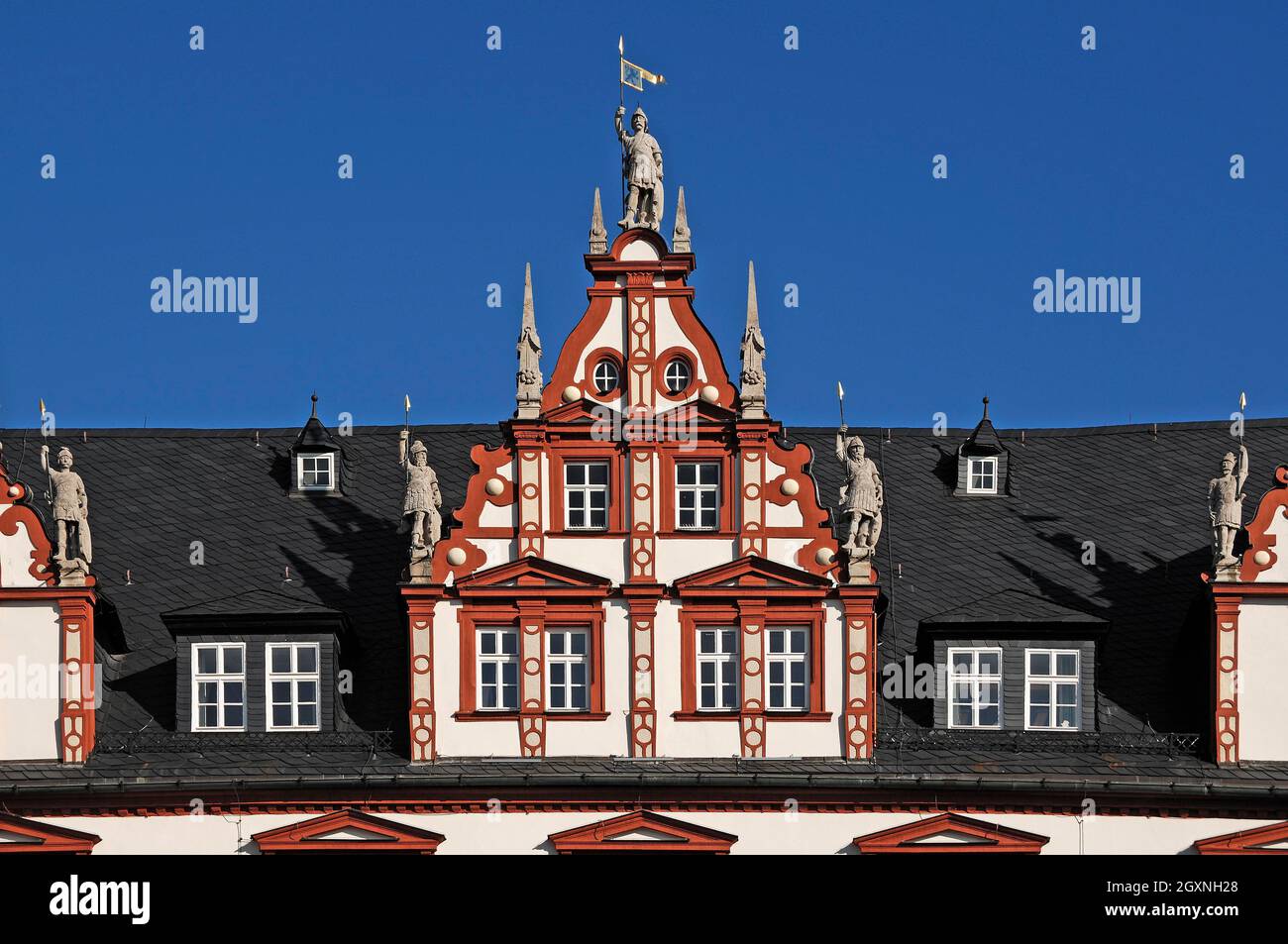 Decorative roof gable with sculptures on the town house, Renaissance ...