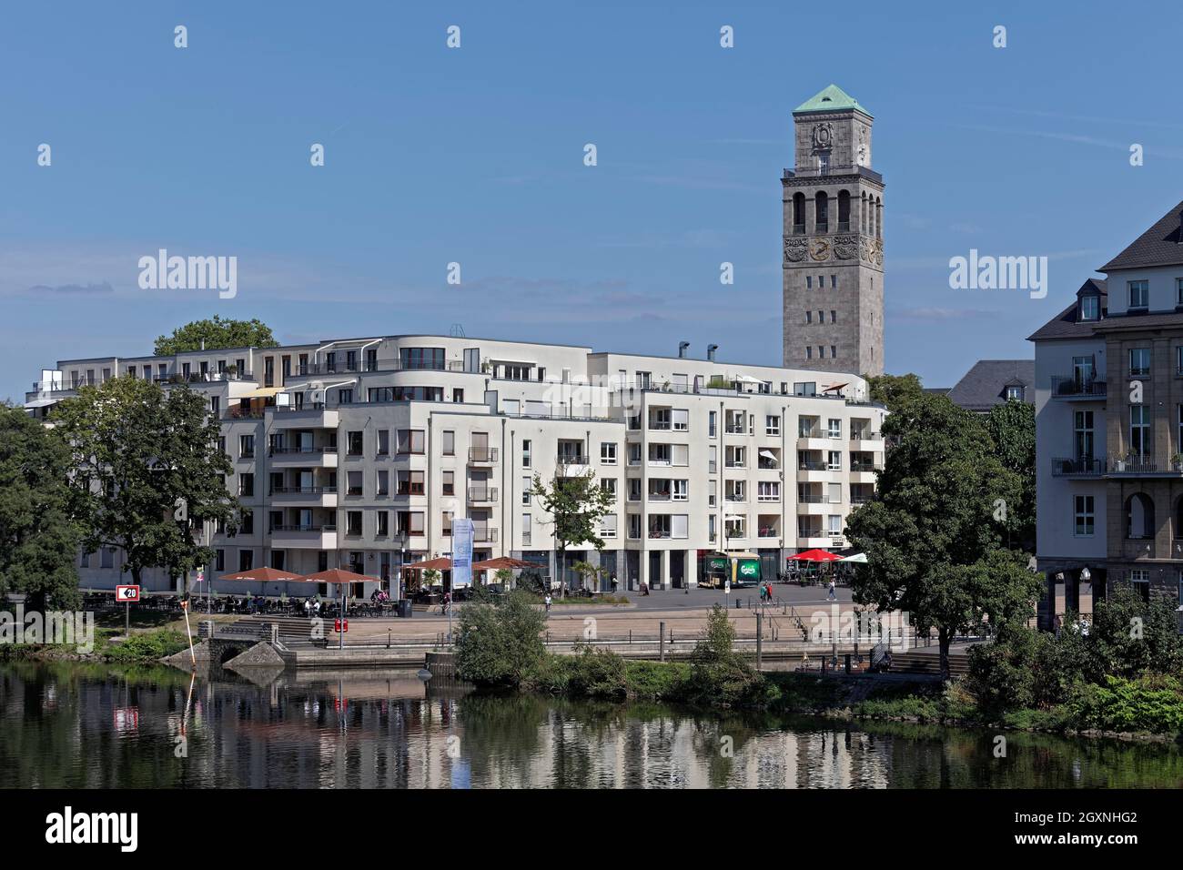 Modern residential complex at the city harbour, historic town hall ...