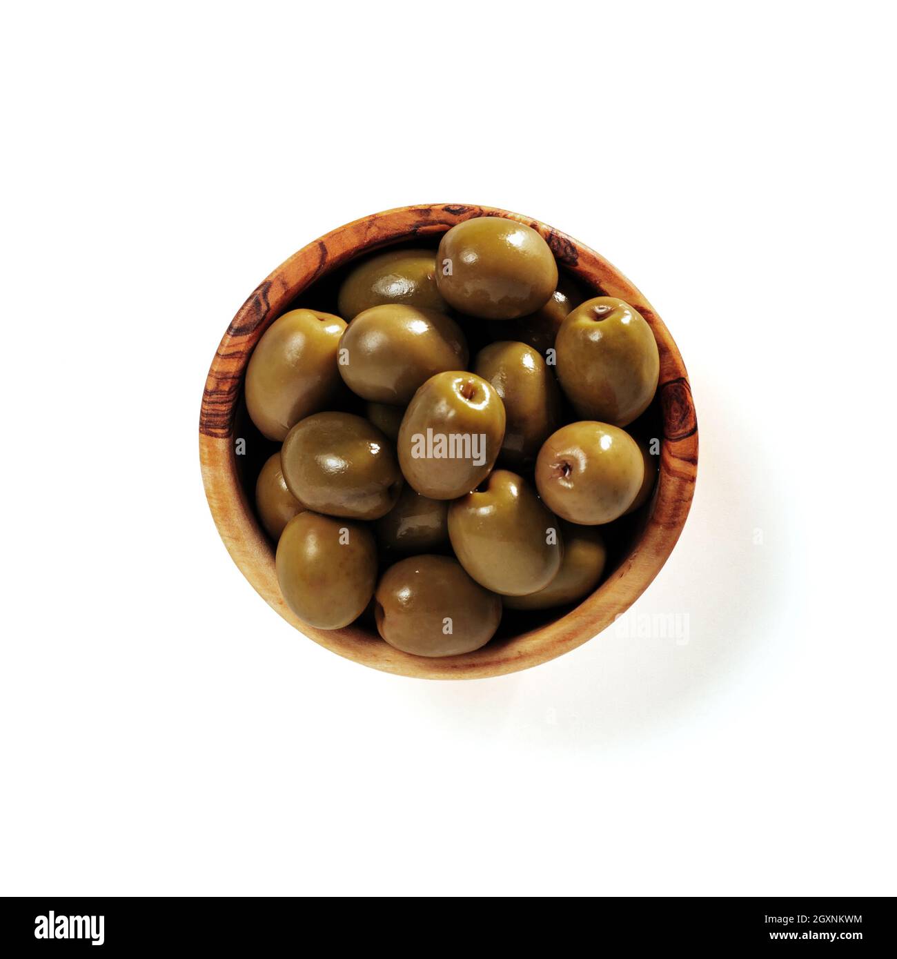 Small wooden bowl with green olives isolated on white background. Flat ...