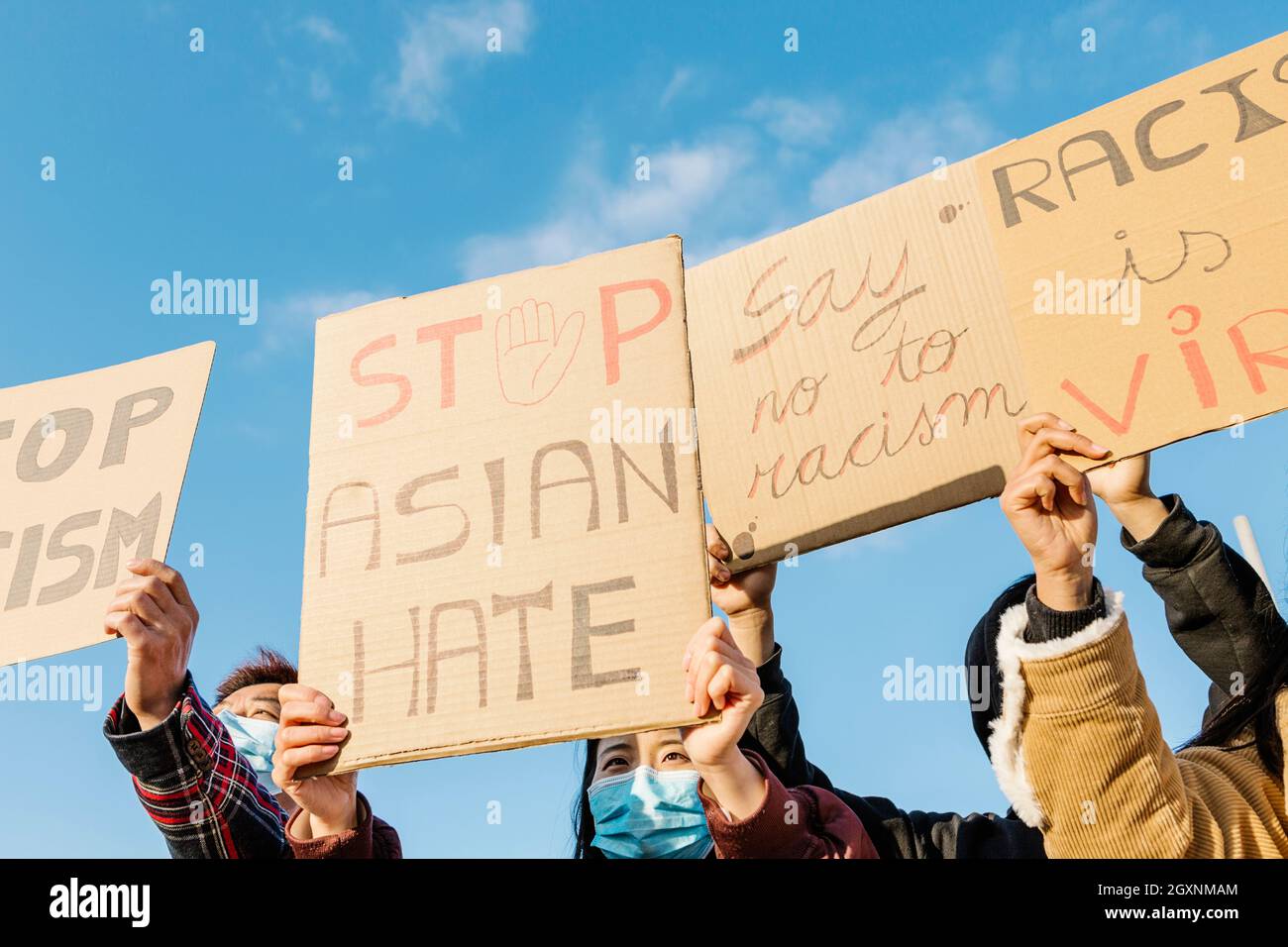 Group of demonstrators protest on the street for equal rights Stock ...