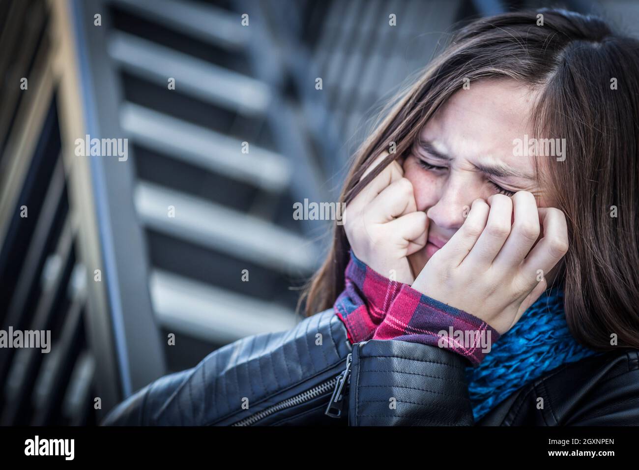 Distressed Young Crying Teen Aged Girl on Staircase Stock Photo - Alamy