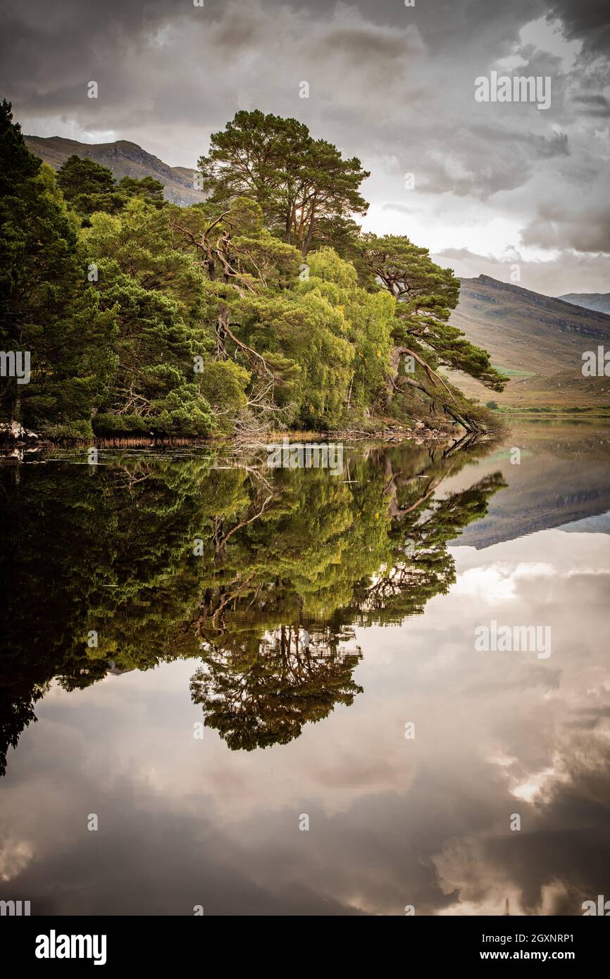 Stunning mirror reflections in Loch Dughail, West coast, Highlands ...