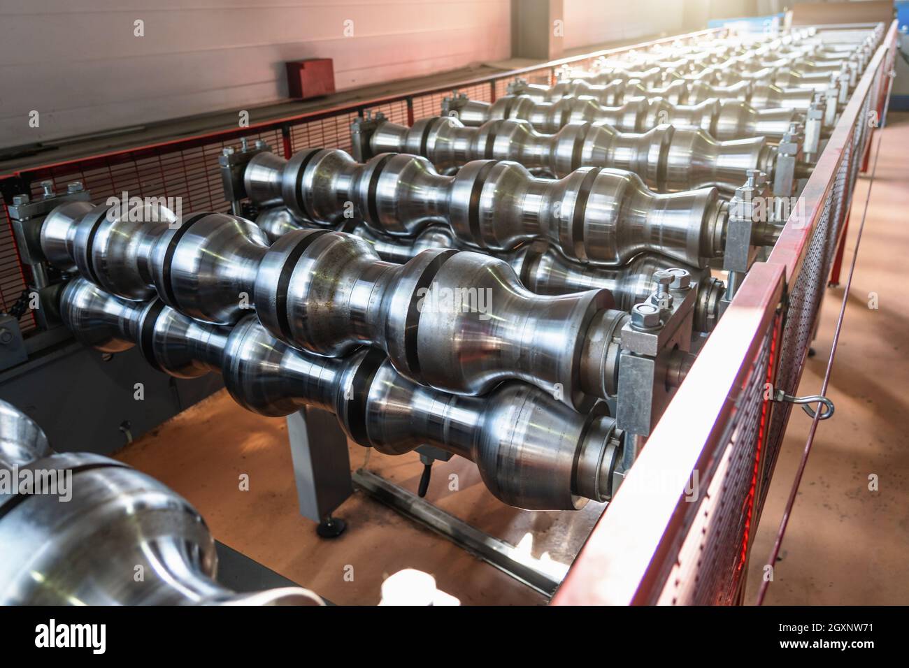 Production line of metal tile for roof. Steel forming machine in ...