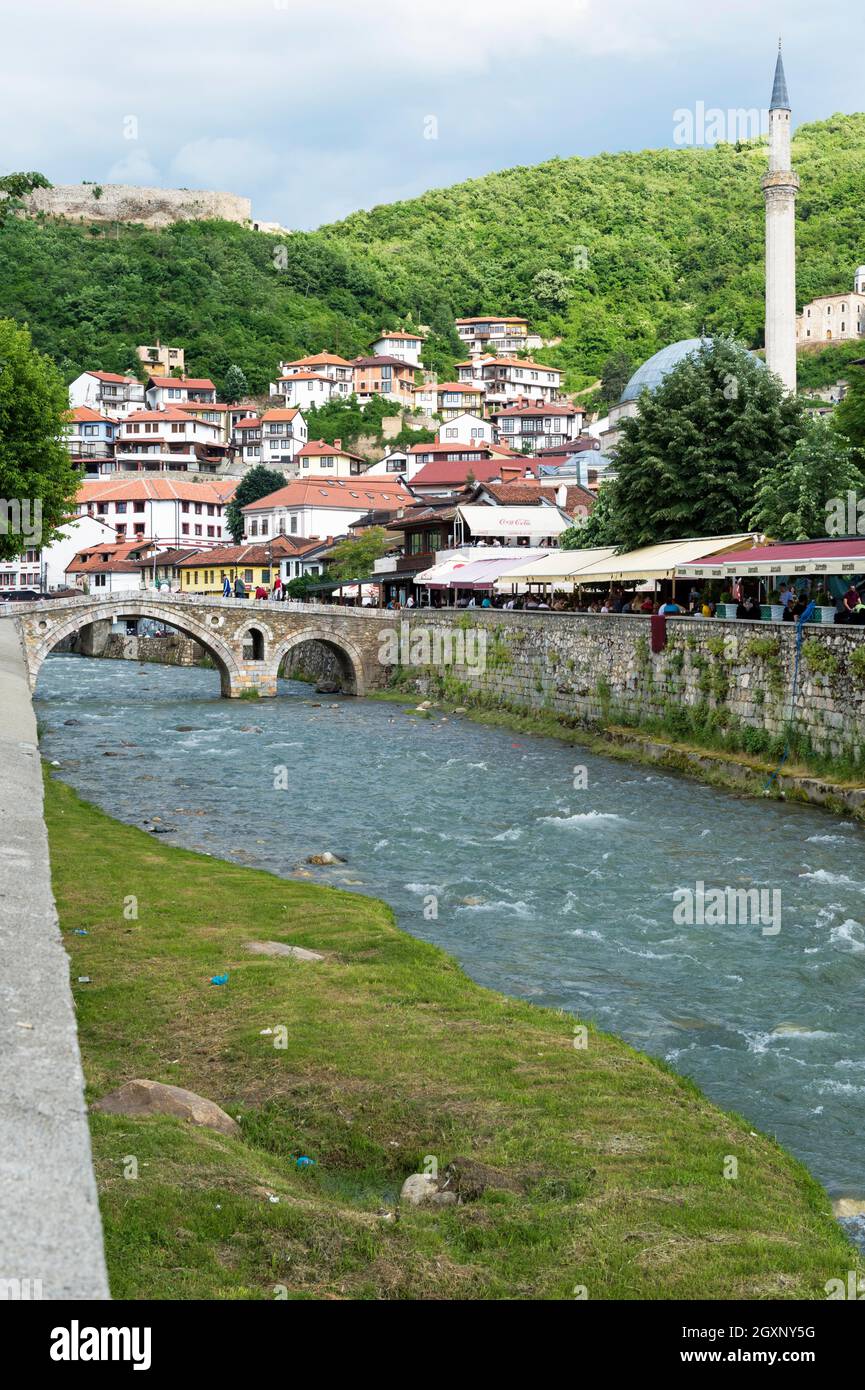 River Bistrica with stone bridge and fortress, Prizren, Kosovo Stock ...