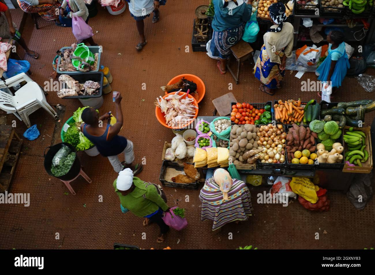 Market woman, meat, chicken, fruit and vegetables, market hall, weekly ...