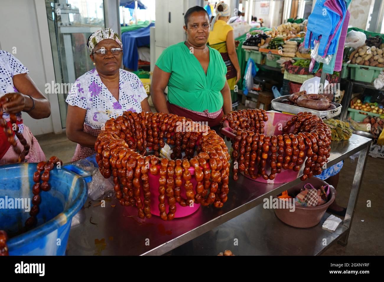 Market woman at the sausage stand, market hall, Plato, Praia, Santiago ...