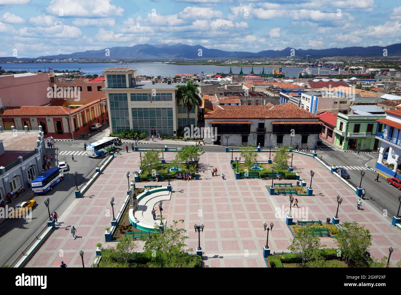 Parque Cespedes, park, on the left Casa de Velazques, oldest building ...