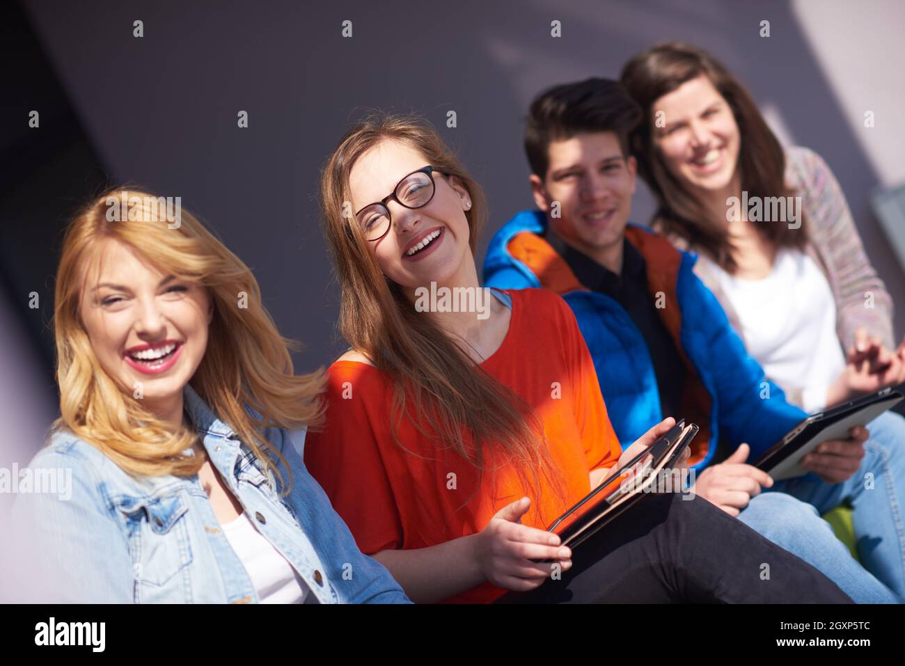 Group teens working together classroom hi-res stock photography and ...