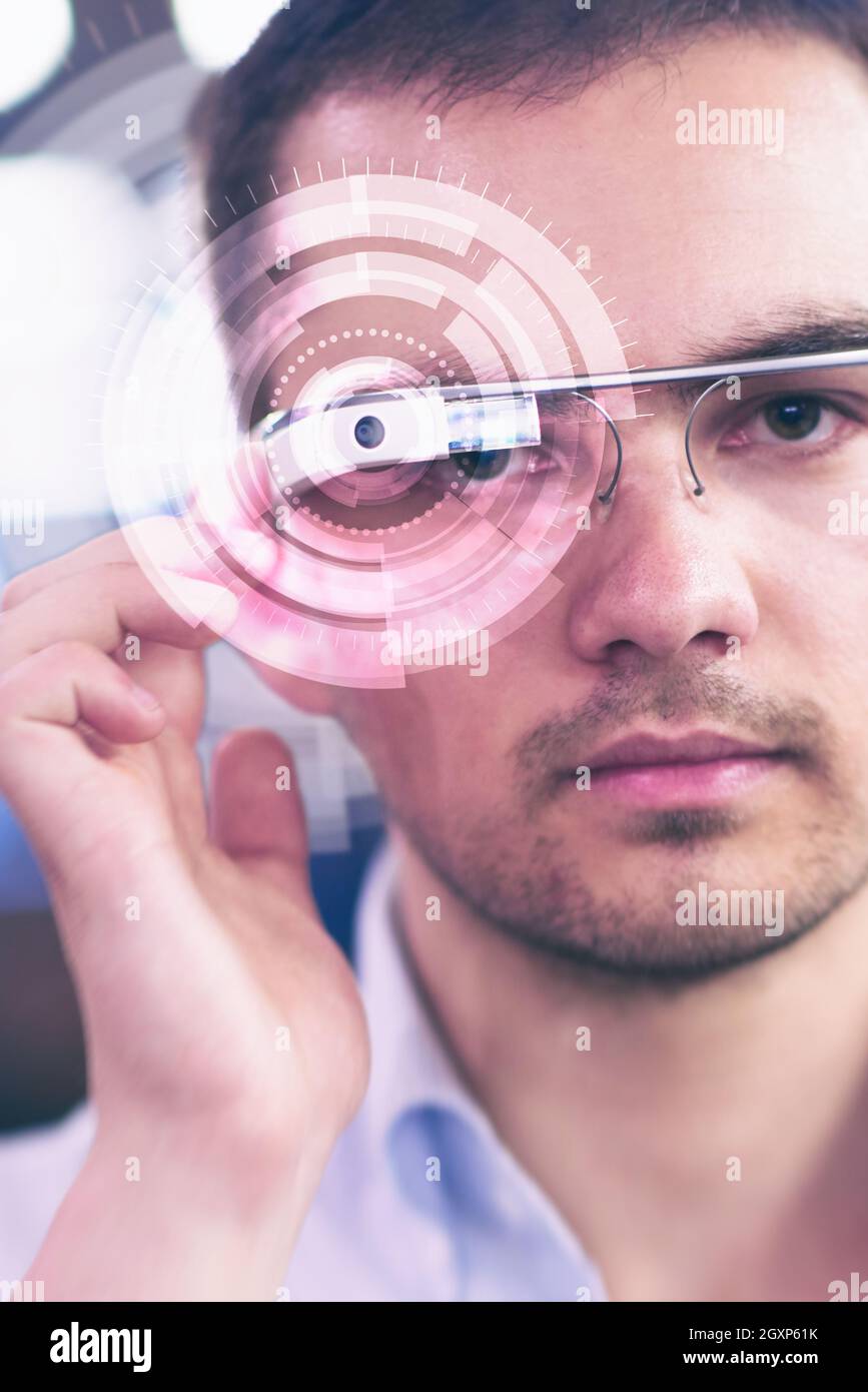 Picture of handsome programmer with futuristic glasses Stock Photo - Alamy