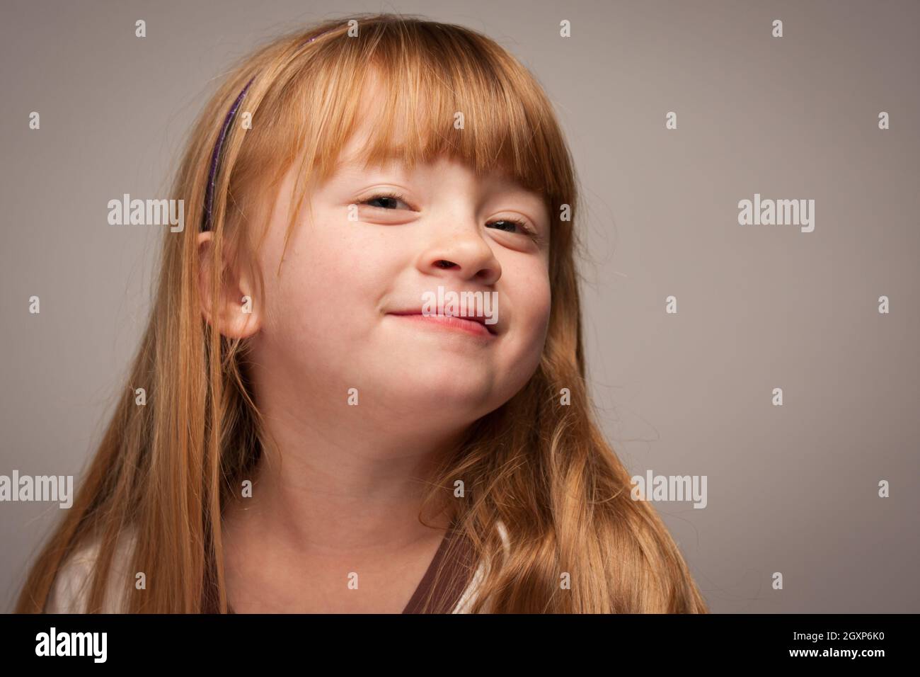 Fun Portrait of an Adorable Red Haired Girl on a Grey Background Stock ...