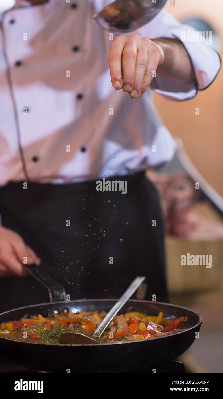 Tossing spices hi-res stock photography and images - Alamy
