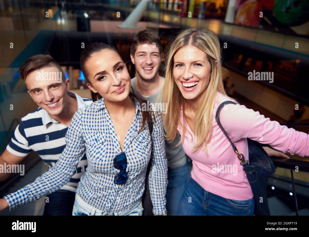 group of happy friends in shopping mall have fun Stock Photo - Alamy