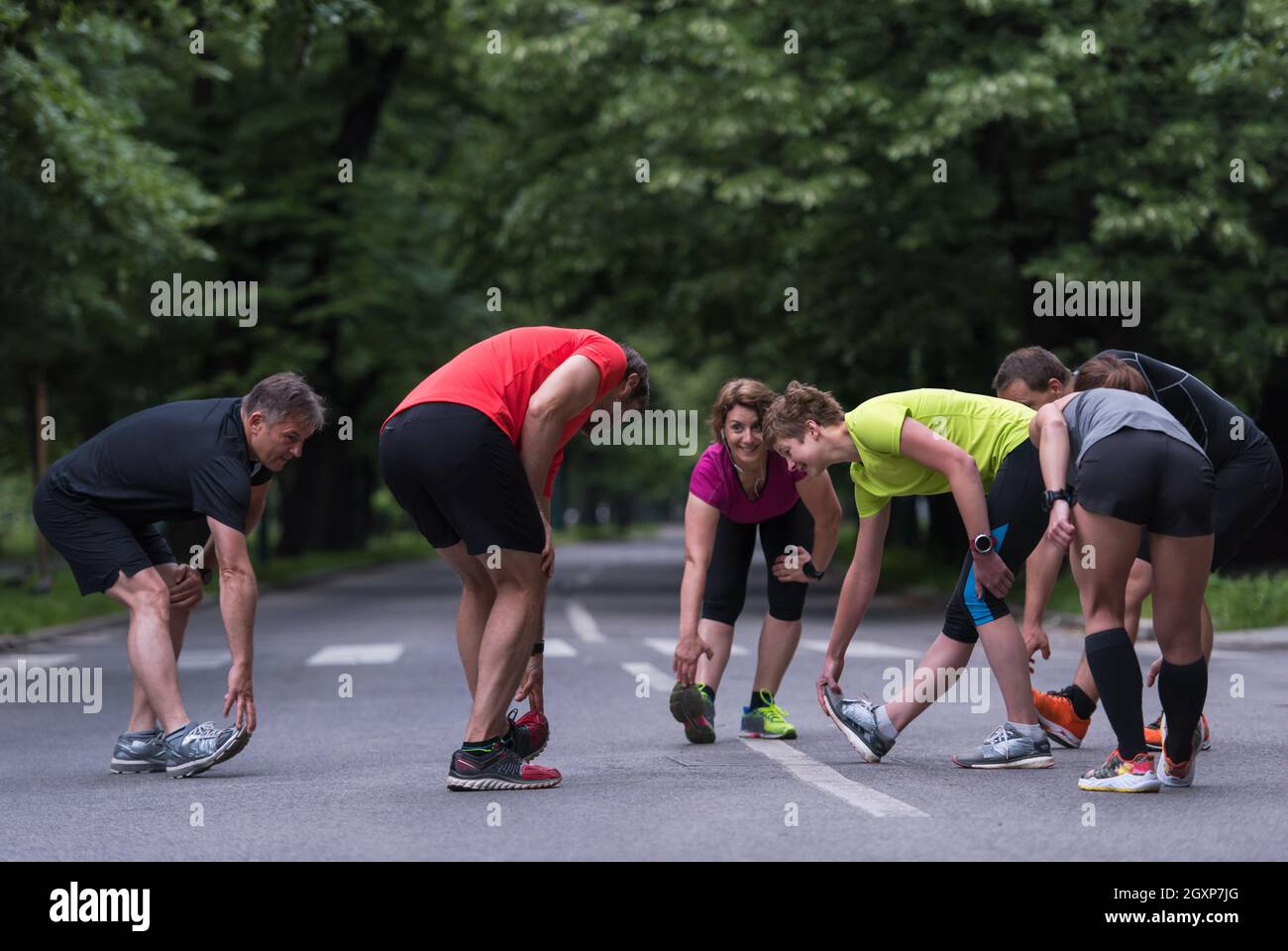 Group female runners warming hi-res stock photography and images - Alamy