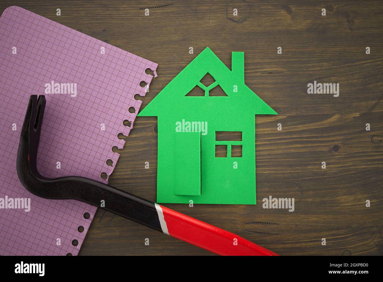 Concept of home renovation or construction with green cutout of model ...