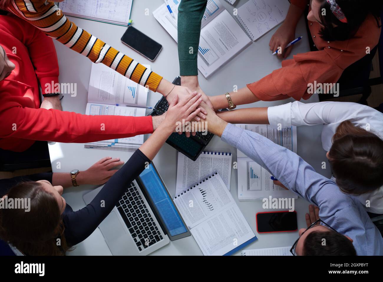 Group of young students in electronics classroom celebrating ...