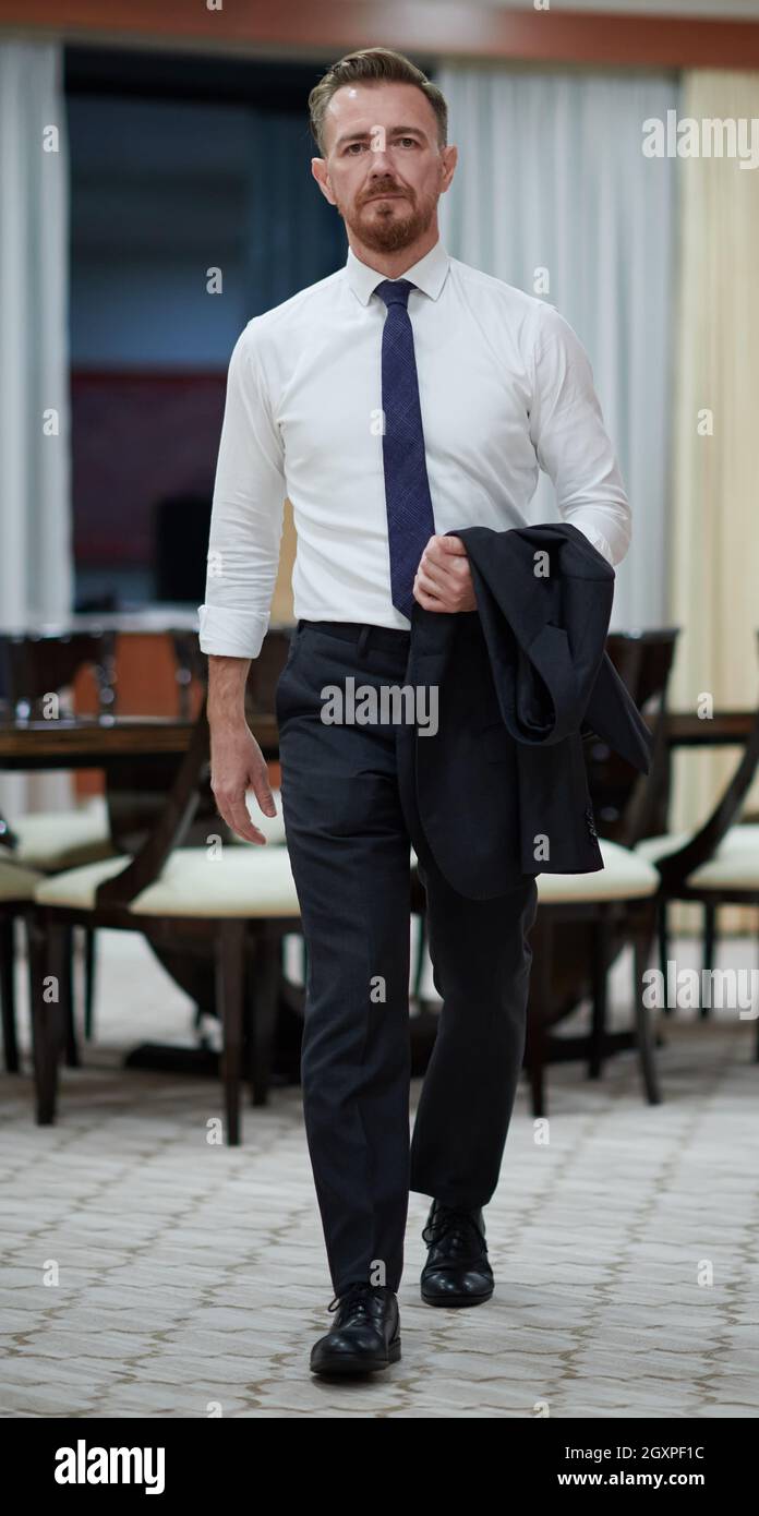 Senior executive businessman at luxury corporate workspace. Portrait of ...