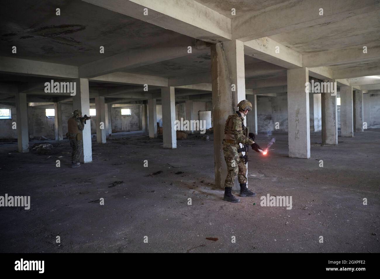special forces soldiers team in urban environment making tactical ...