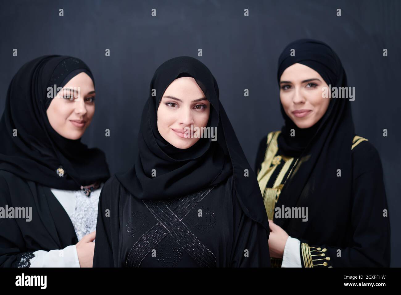 group portrait of beautiful muslim women in fashionable dress with ...