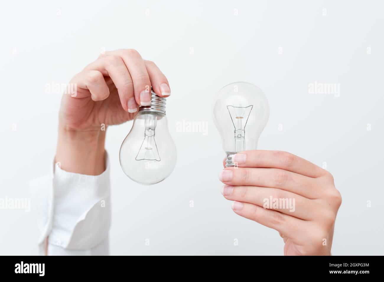Woman Hands Holding Lamp Presenting Ideas For Project, Man Palm Showing ...