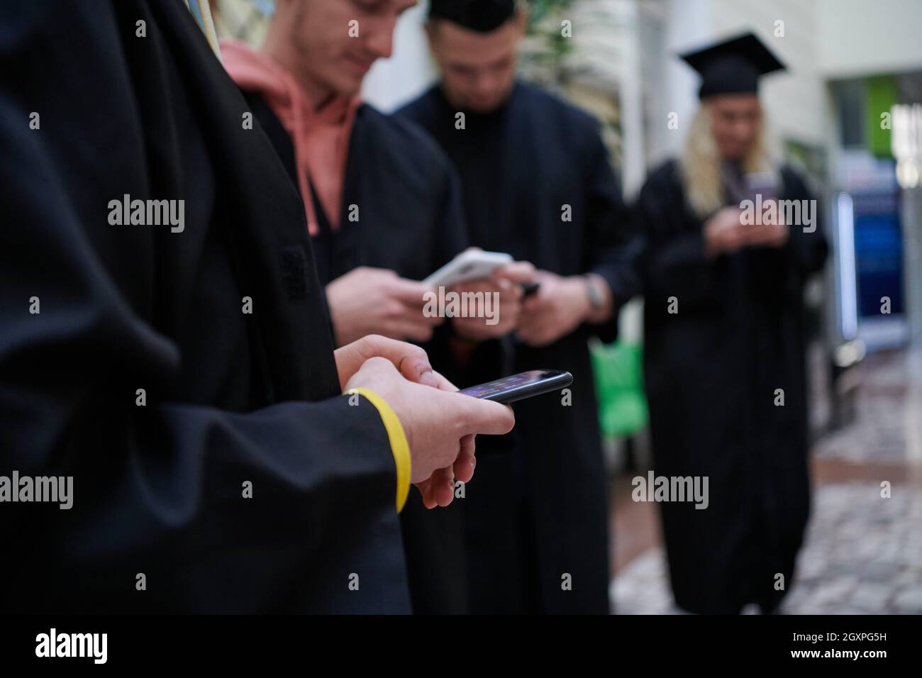 education, graduation, technology and people concept - group of happy ...