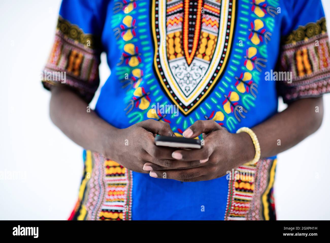 native sudan african male using smart phone isolated on white ...