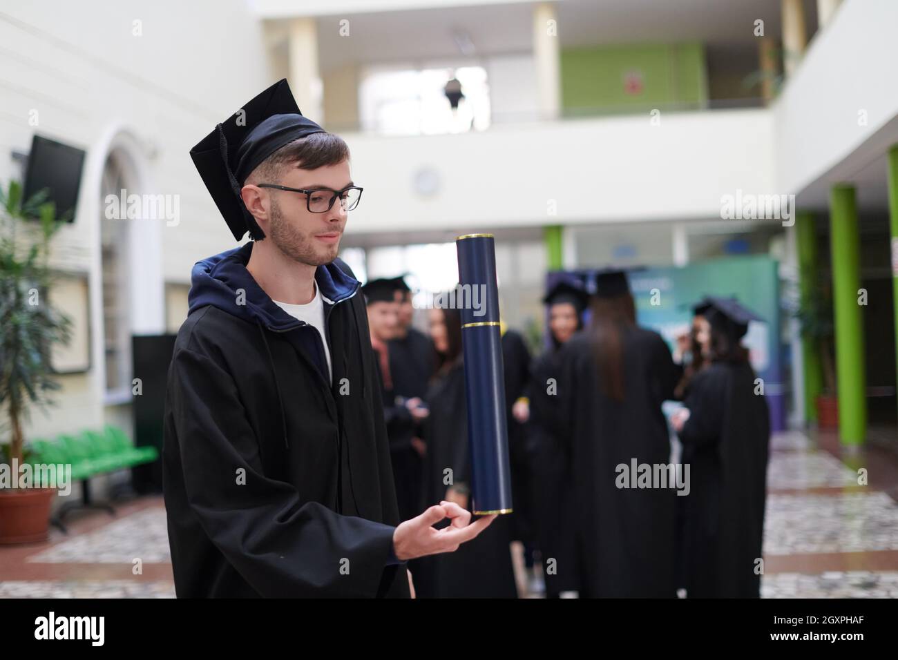 Happy man portrait on her graduation day University. Education and ...