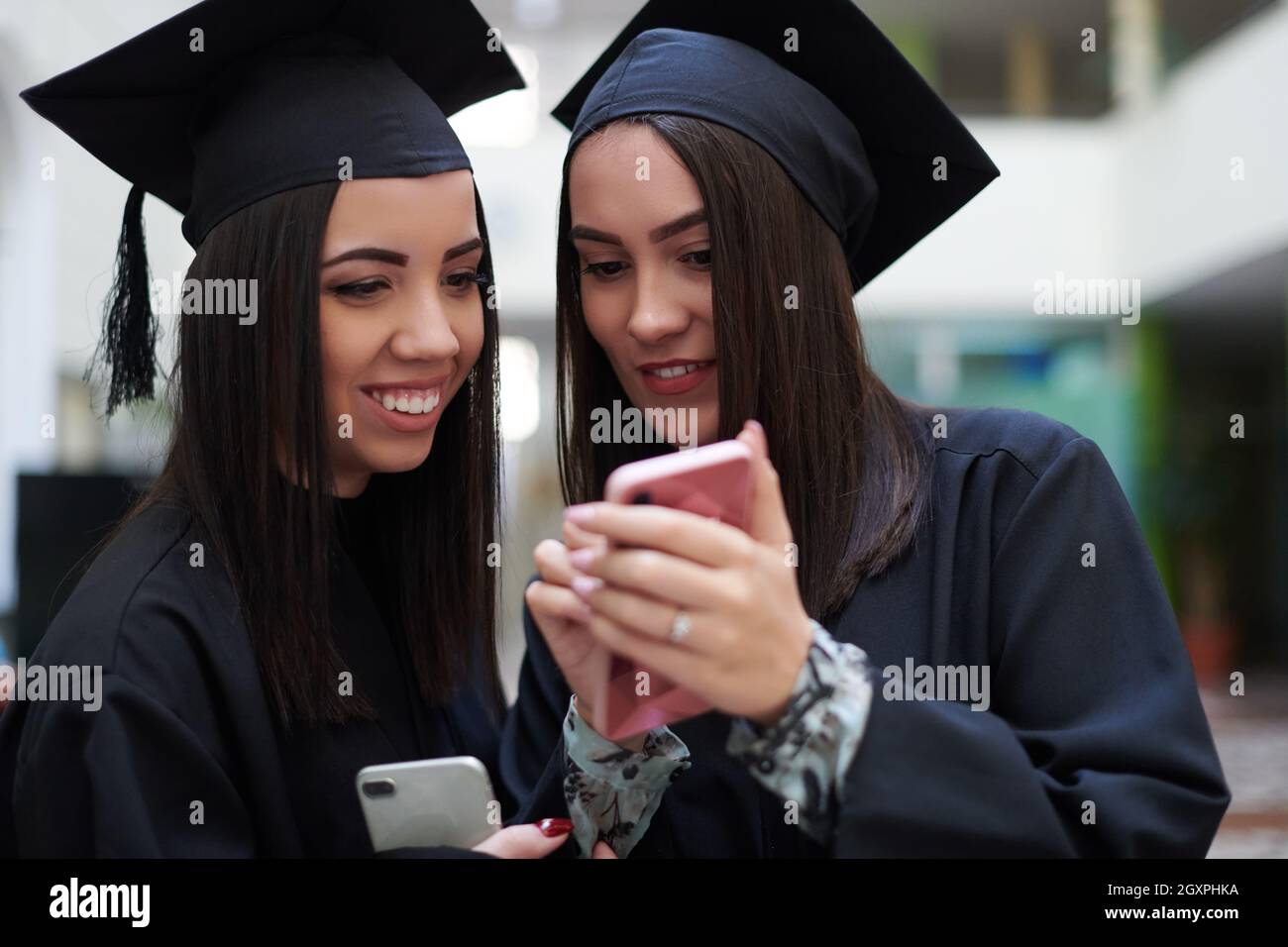 Joyful students celebrating graduation hi-res stock photography and ...