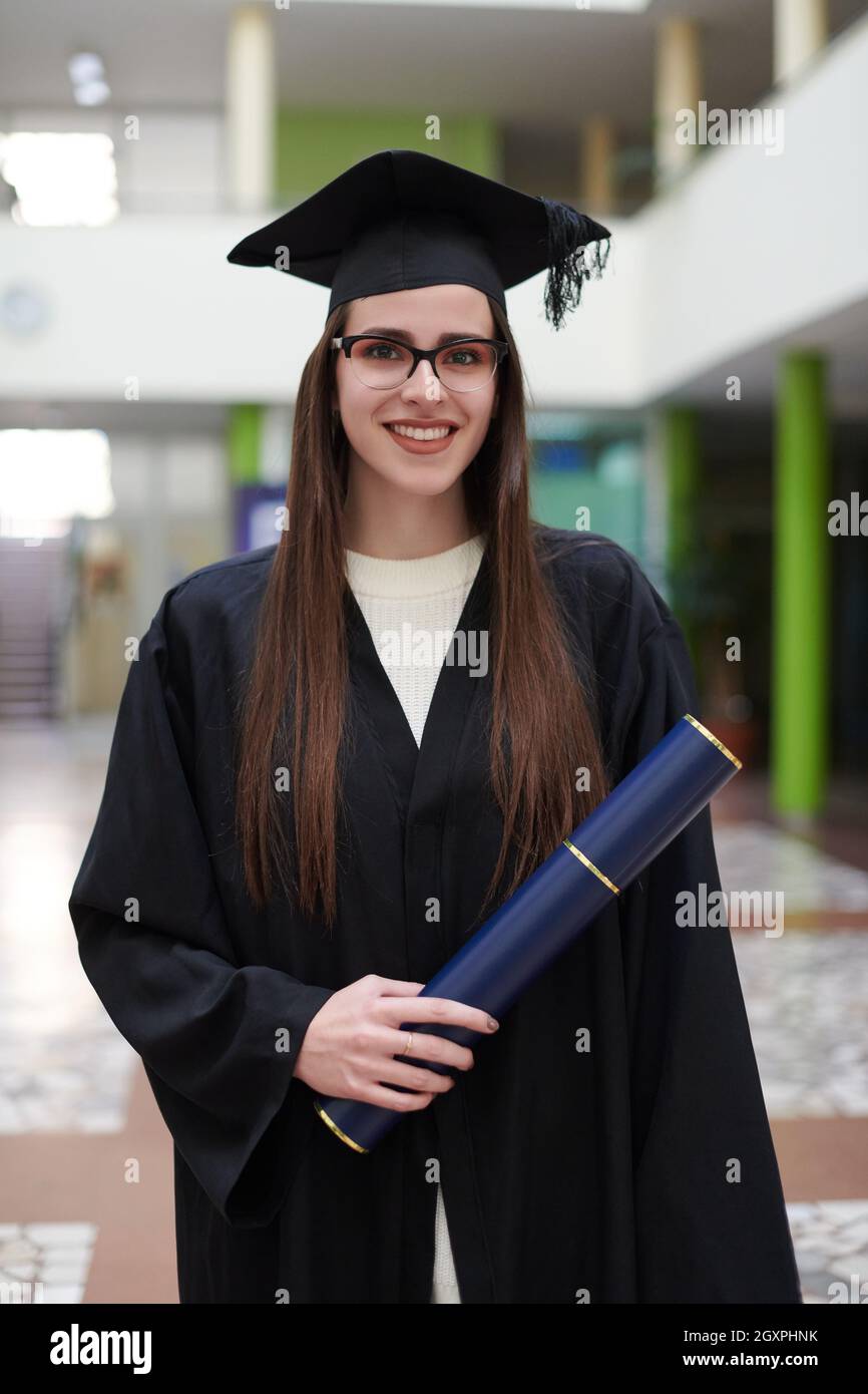 Happy woman portrait on her graduation day University. Education and ...