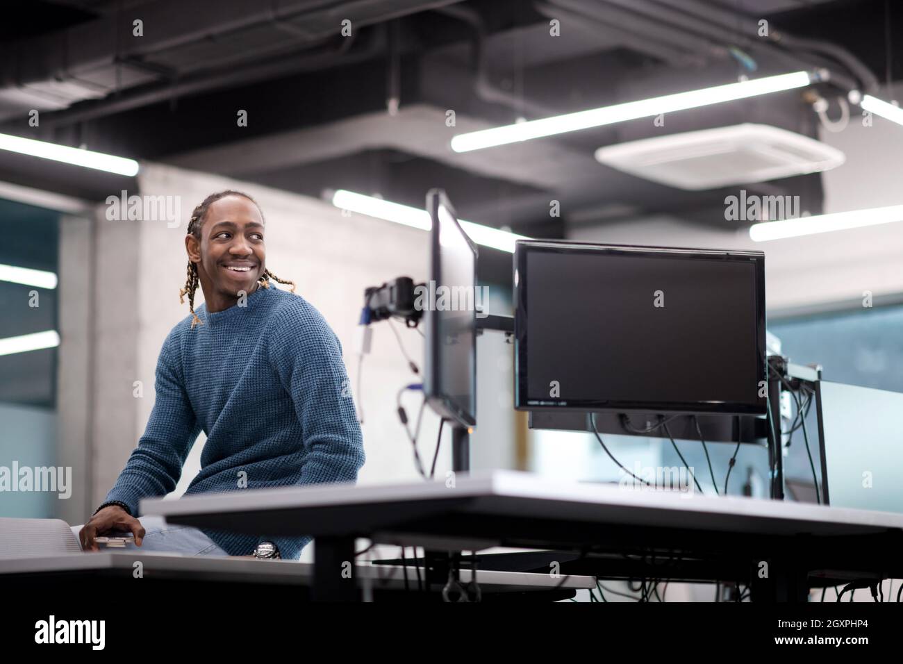 Portrait of young smiling african american male software developer ...