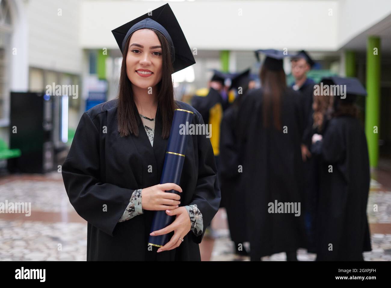 Happy woman portrait on her graduation day University. Education and ...