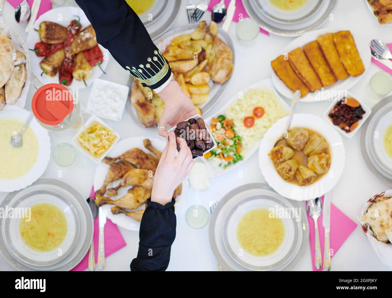 Eid Mubarak Muslim family having Iftar dinner eating dates to break ...