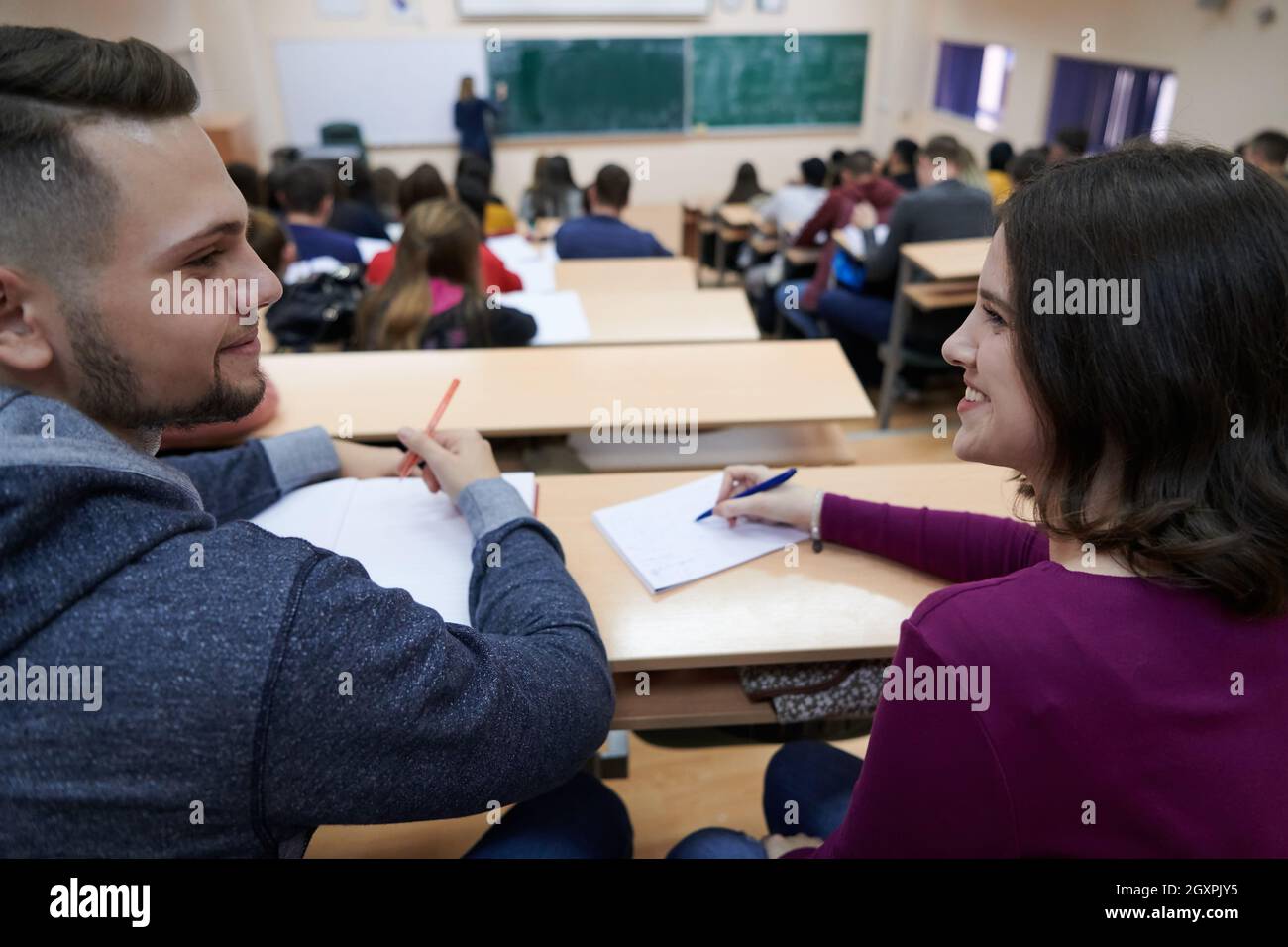 In the Classroom Multi Ethnic Students Listening to a Lecturer and ...